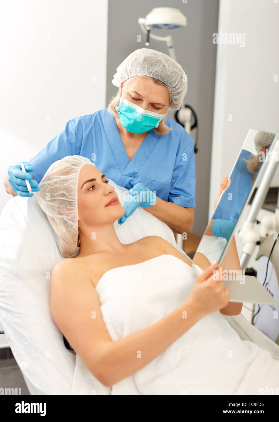 Woman getting ready for plastic surgery Stock Photo - Alamy