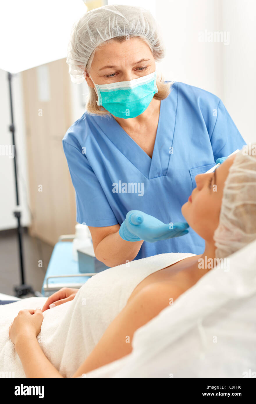 Woman getting ready for plastic surgery Stock Photo - Alamy