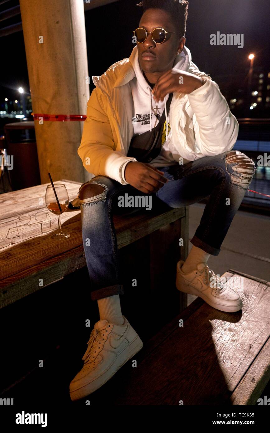 Man outside night club hi-res stock photography and images - Alamy