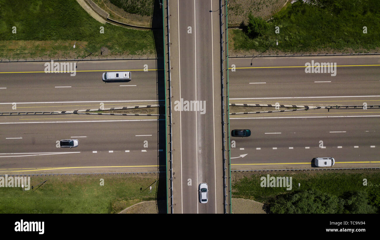 Top down view of highway intersection car bridge and moving cars Stock ...