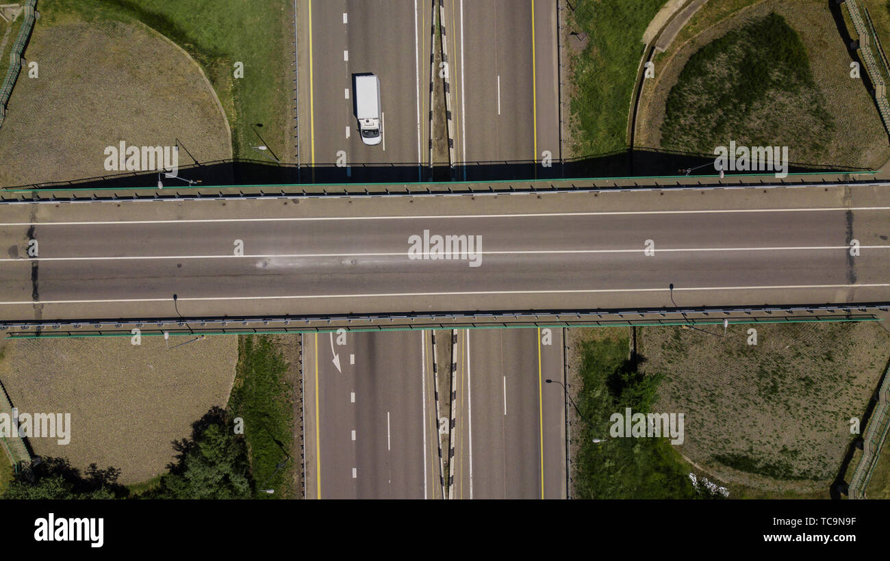 View from above of highway intersection car bridge and moving cars ...