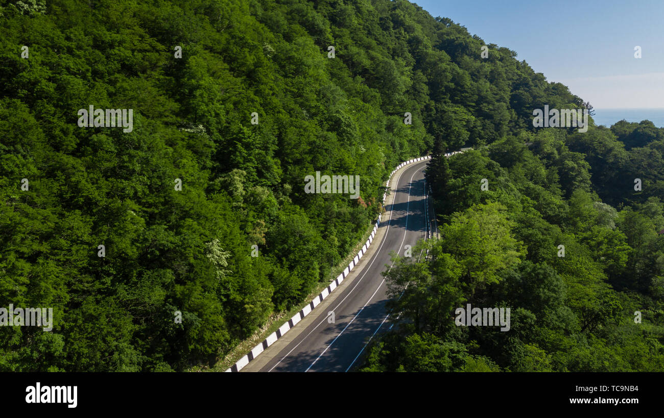 Curved asphalt highway road in mountains of South Russia Stock Photo ...