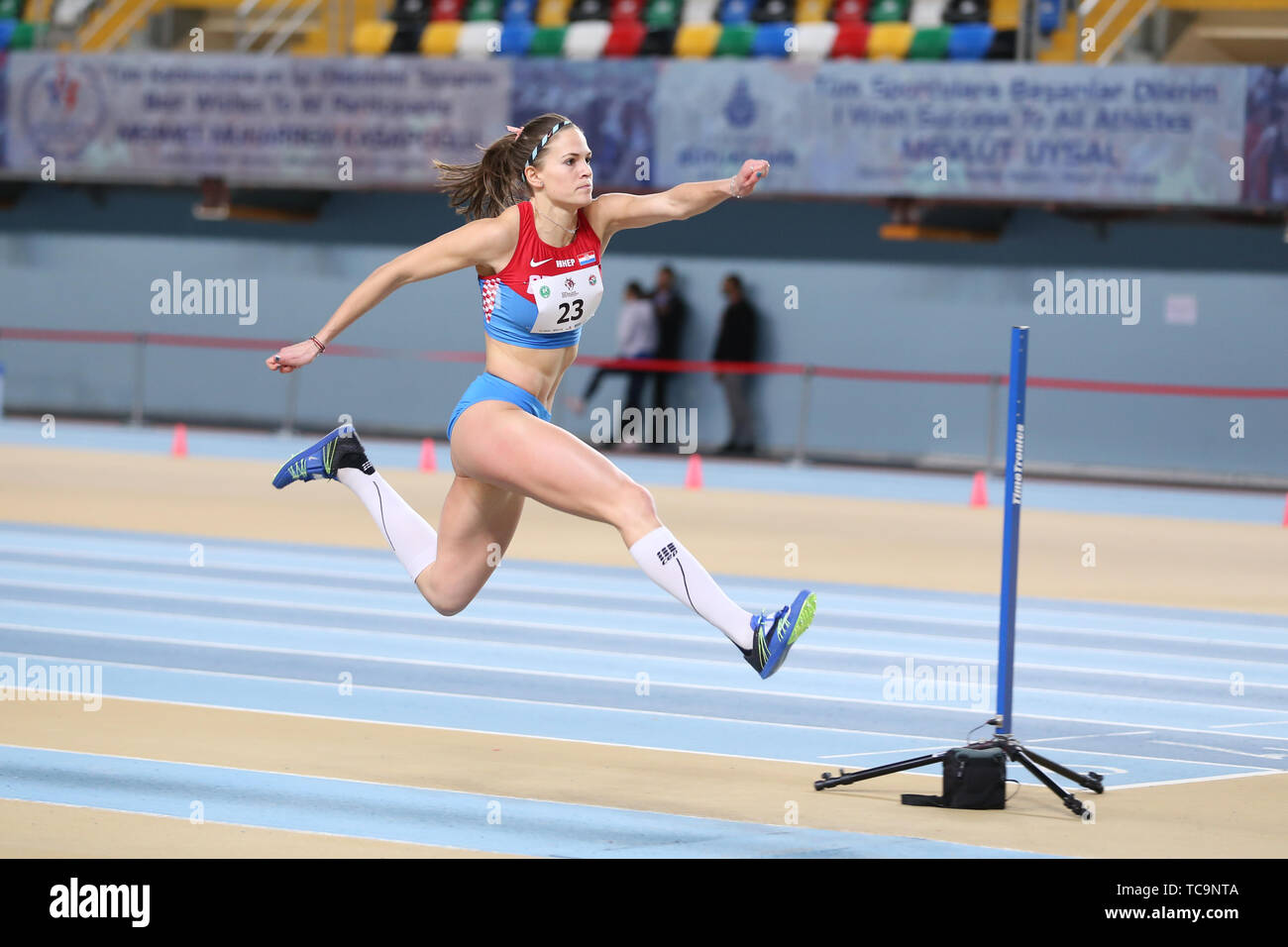 ISTANBUL, TURKEY - FEBRUARY 16, 2019: Undefined athlete triple jumping ...