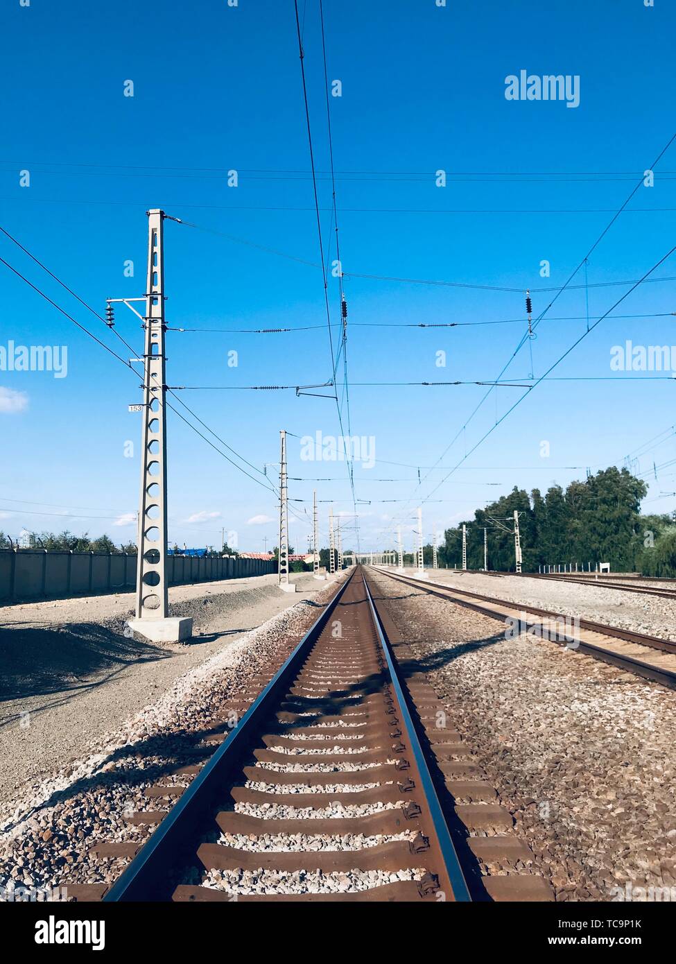 A railway station, an extension of the railway, full of staggered wires ...
