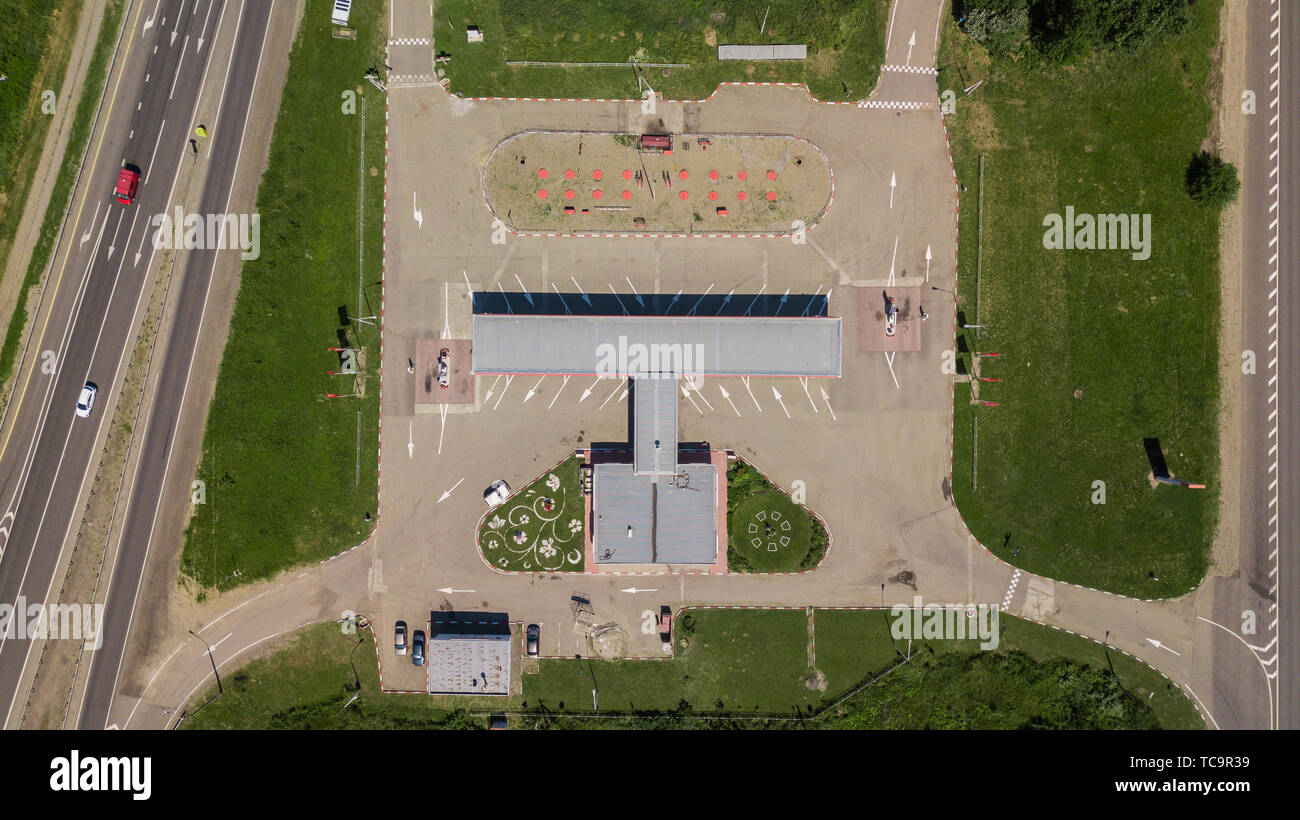 Aerial top down view of gas, filling station Stock Photo - Alamy
