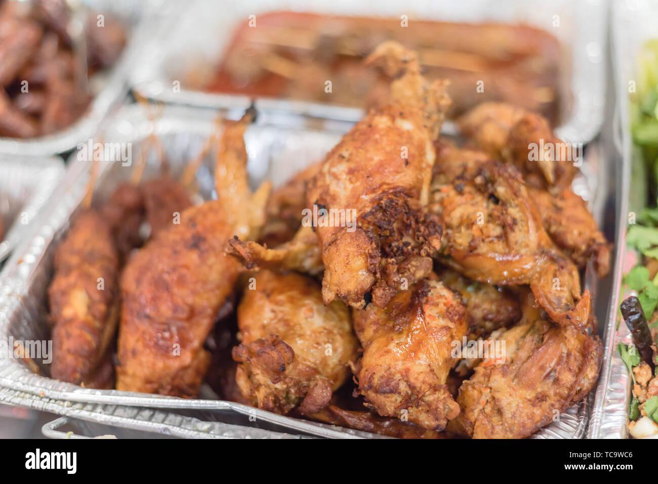 Roasted chicken at Asian market stand in America Stock Photo - Alamy