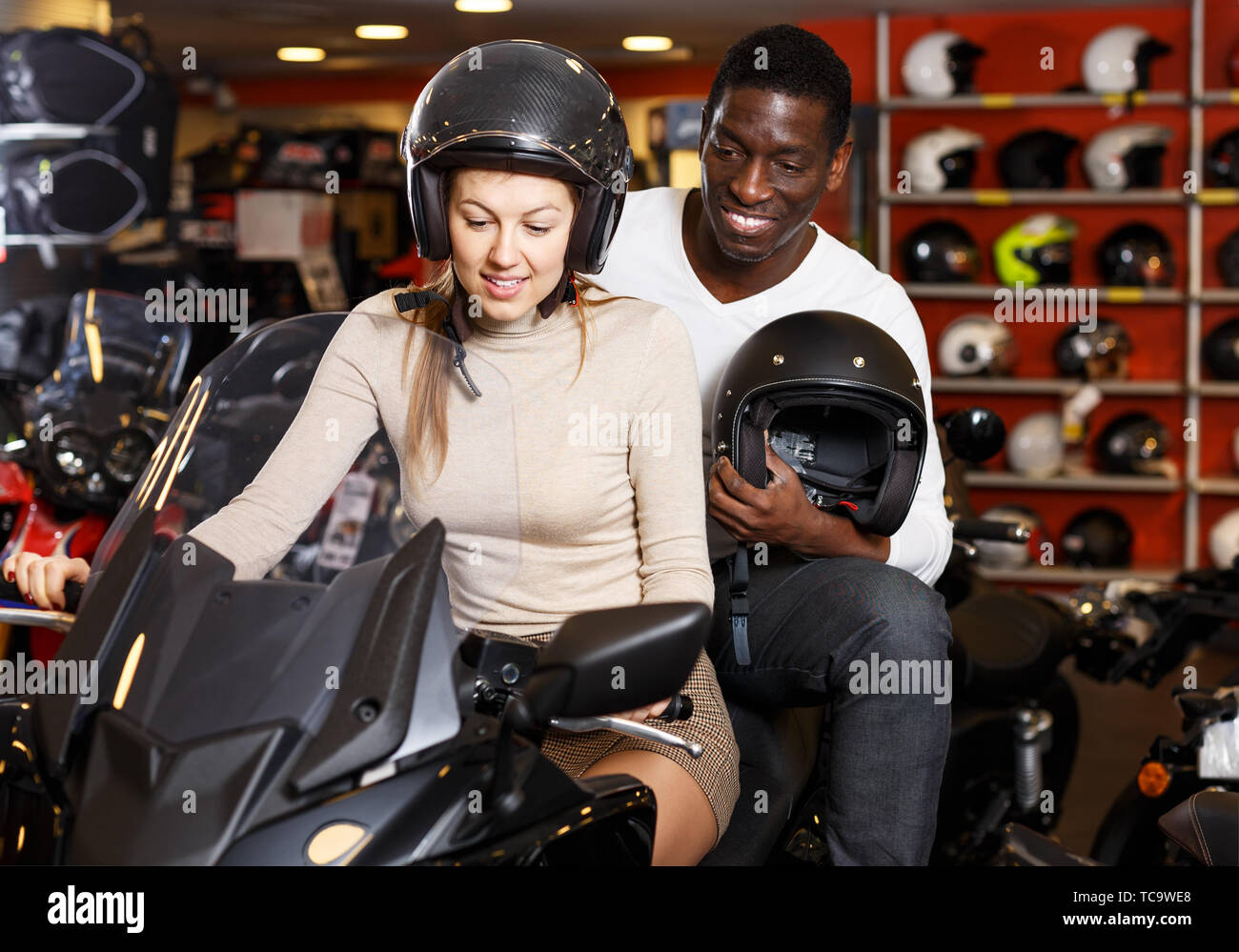 African woman on motorcycle hi-res stock photography and images - Alamy