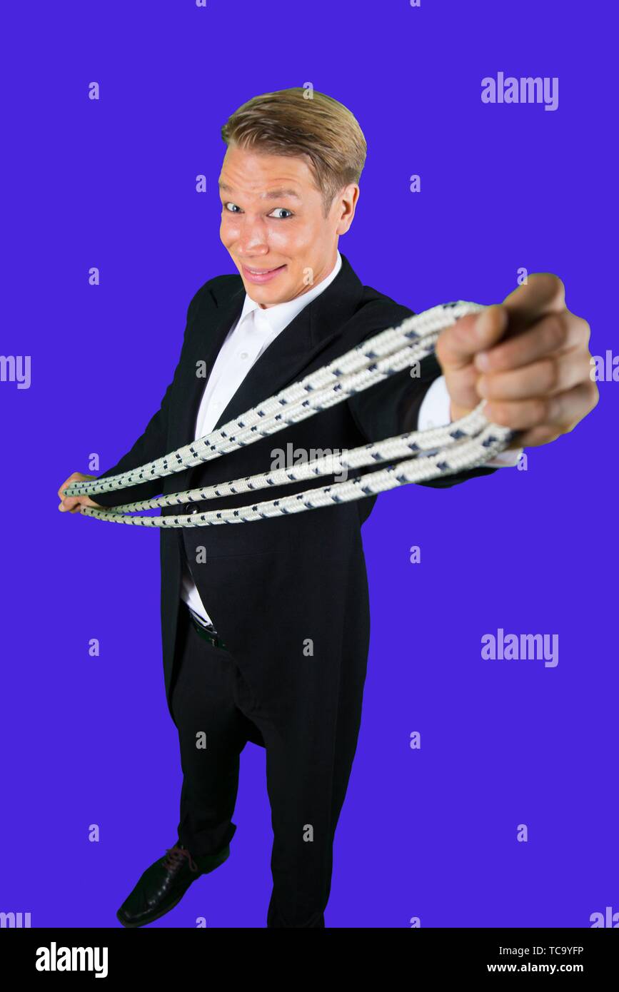 Elegant and happy juggler stretching juggling rope Stock Photo - Alamy