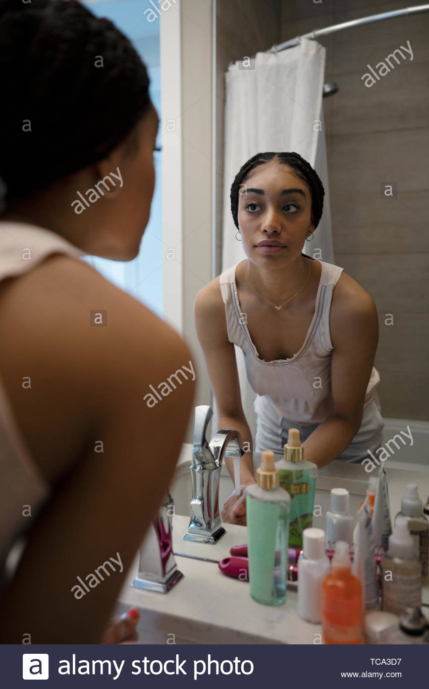 Girl washing face not teeth hi-res stock photography and images - Alamy