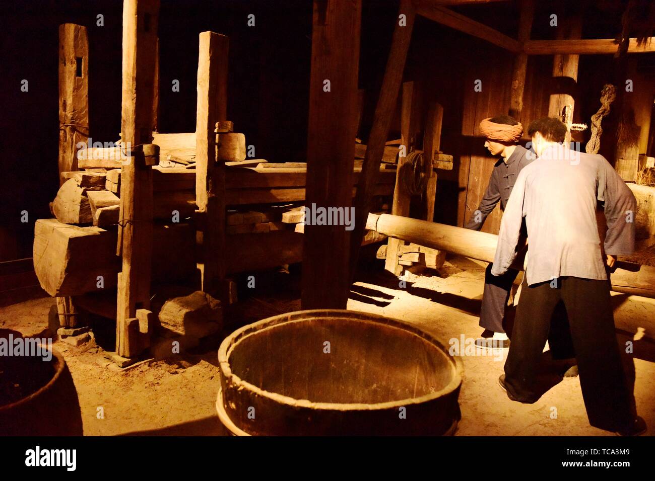 The ancient method of extracting oil Stock Photo - Alamy