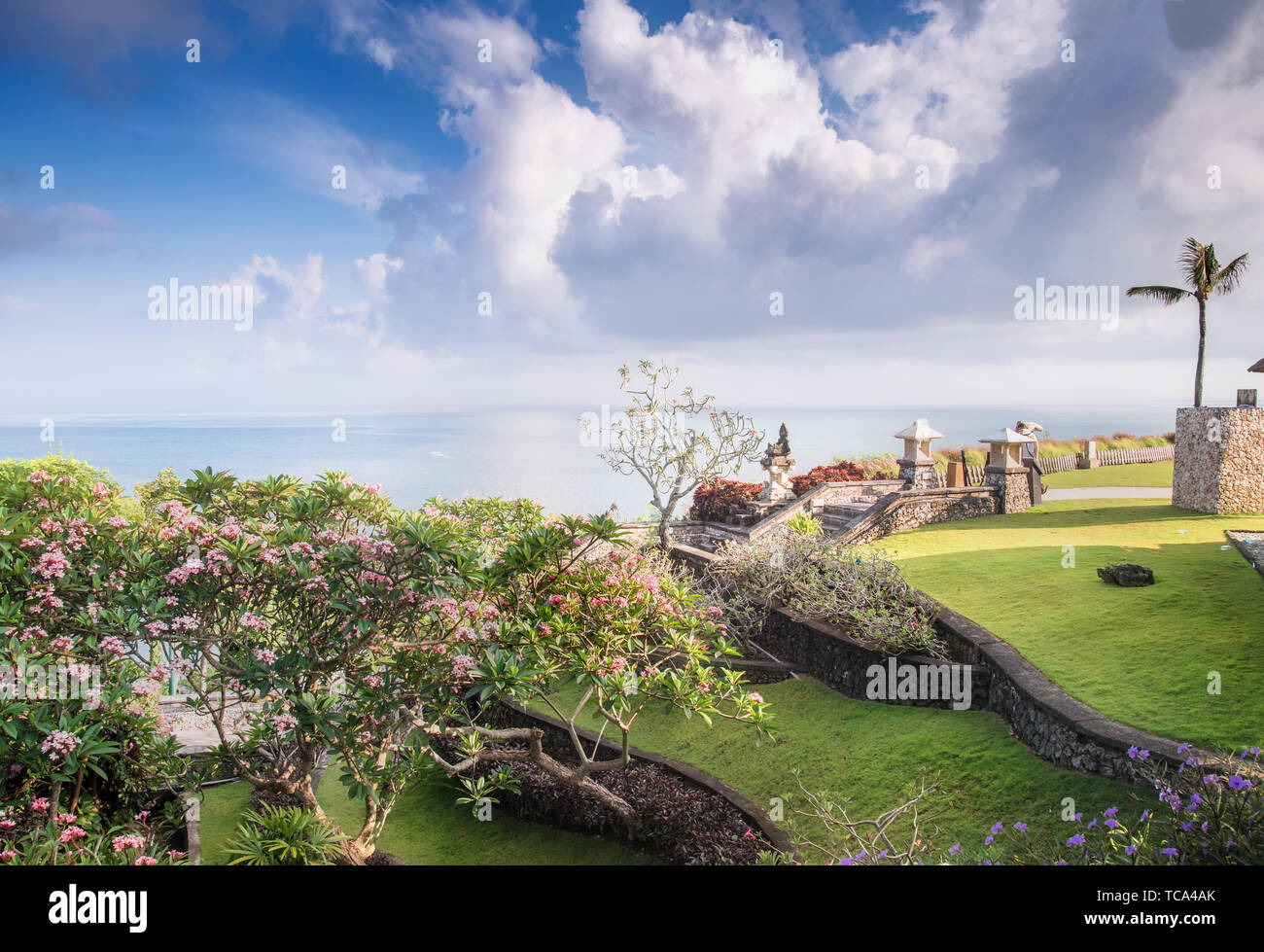 Bali blue sky and white clouds under Indian Ocean resort hotel waves ...