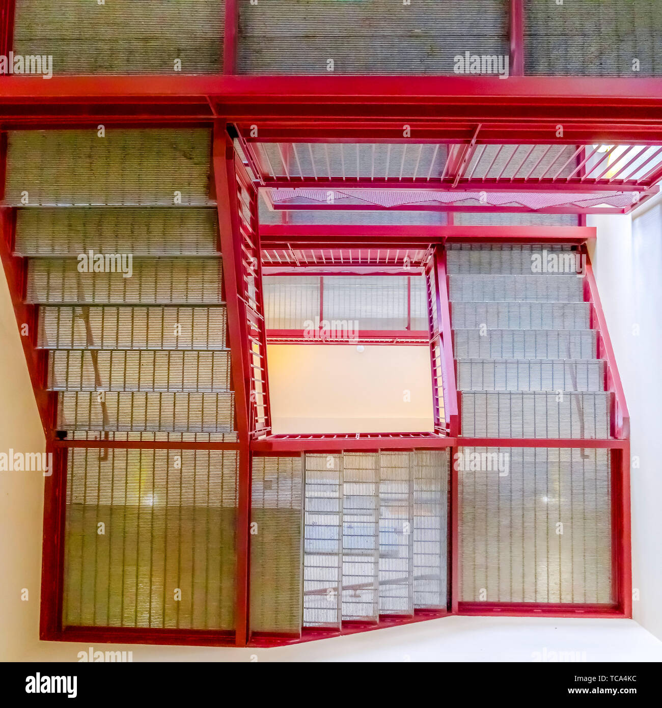 Square Flight of stairs viewed from the bottom floor inside a building ...