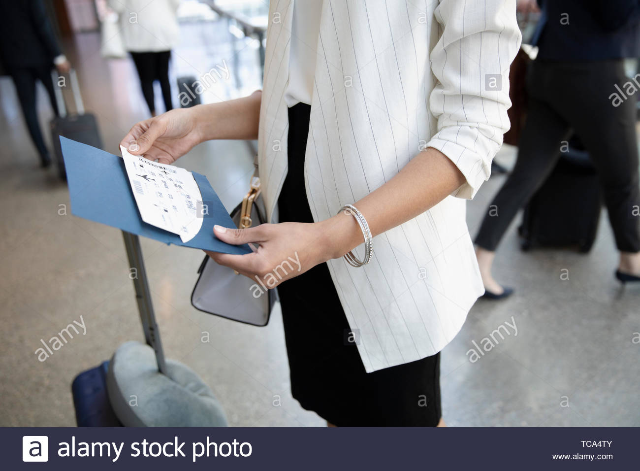 Checking ticket hi-res stock photography and images - Alamy