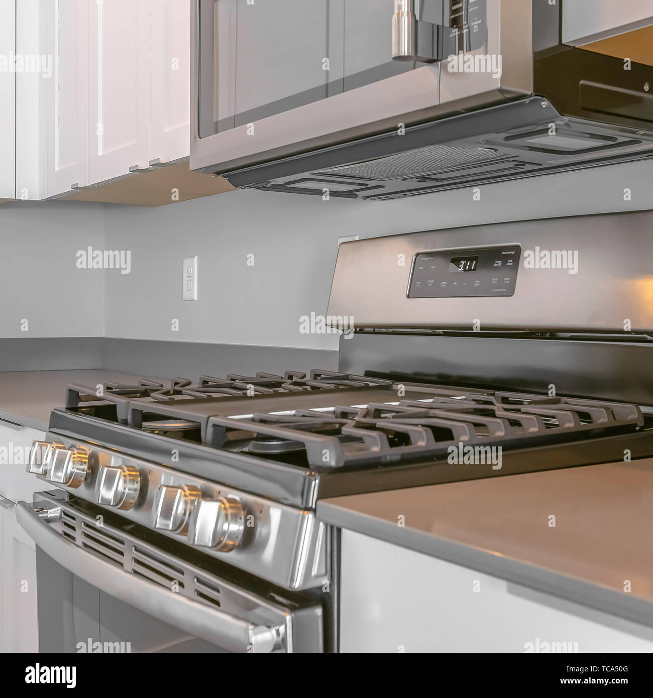 Frame Square Range with cooktop and oven inside the modern kitchen of a ...