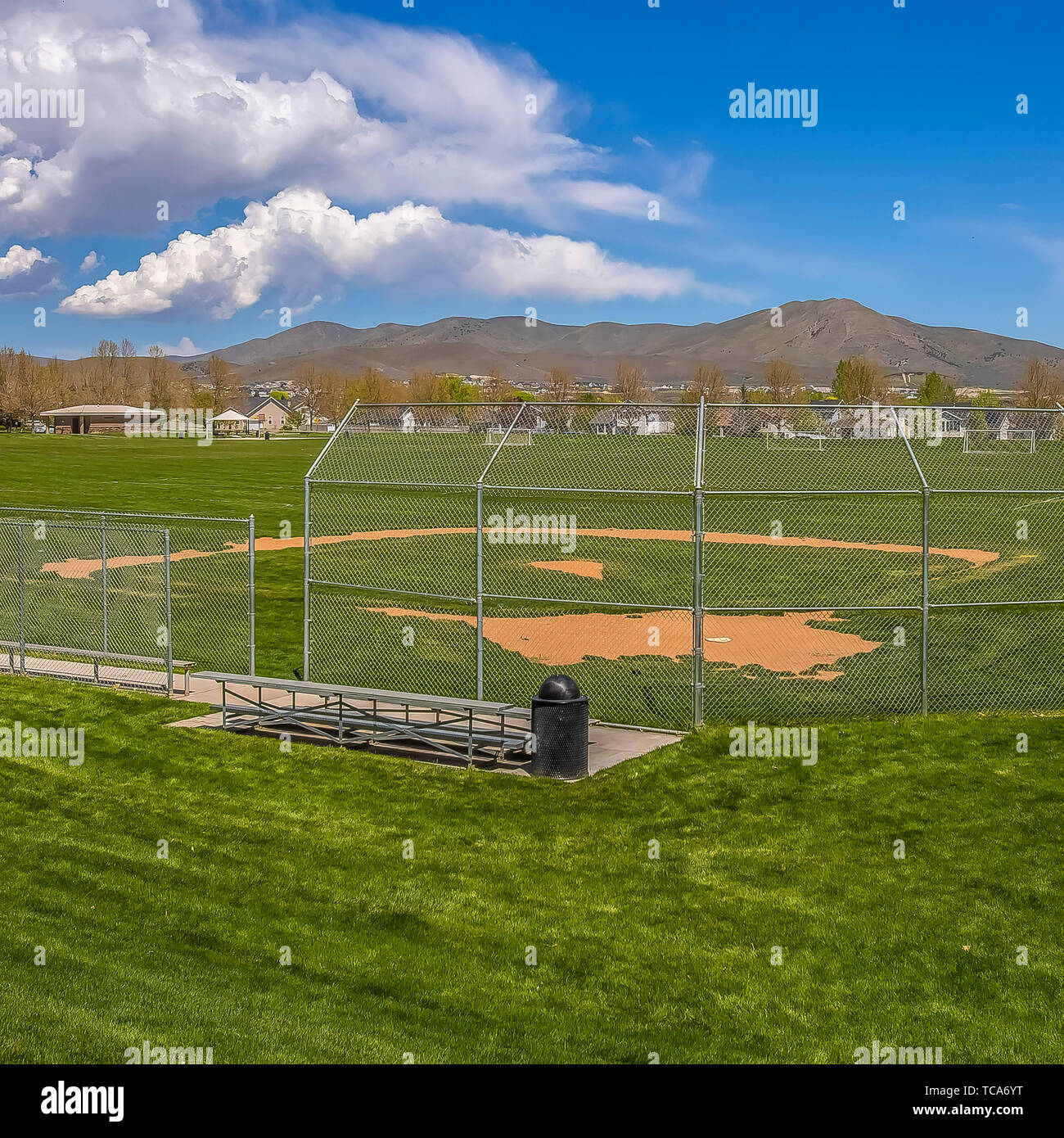 Frame Square Softball or Baseball field with view of mountain and sky ...