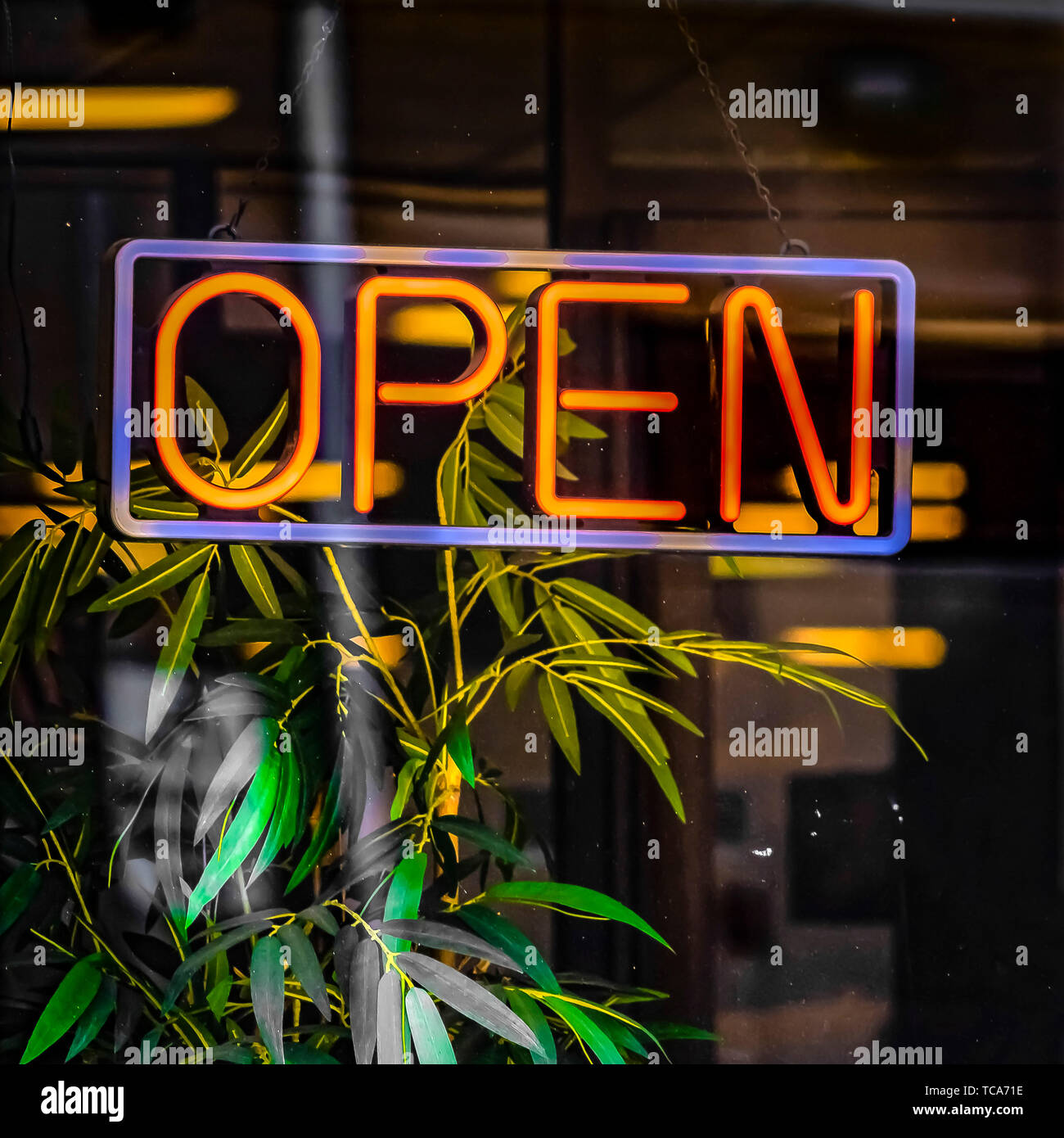 Neon sign hanging on wall hi-res stock photography and images - Alamy
