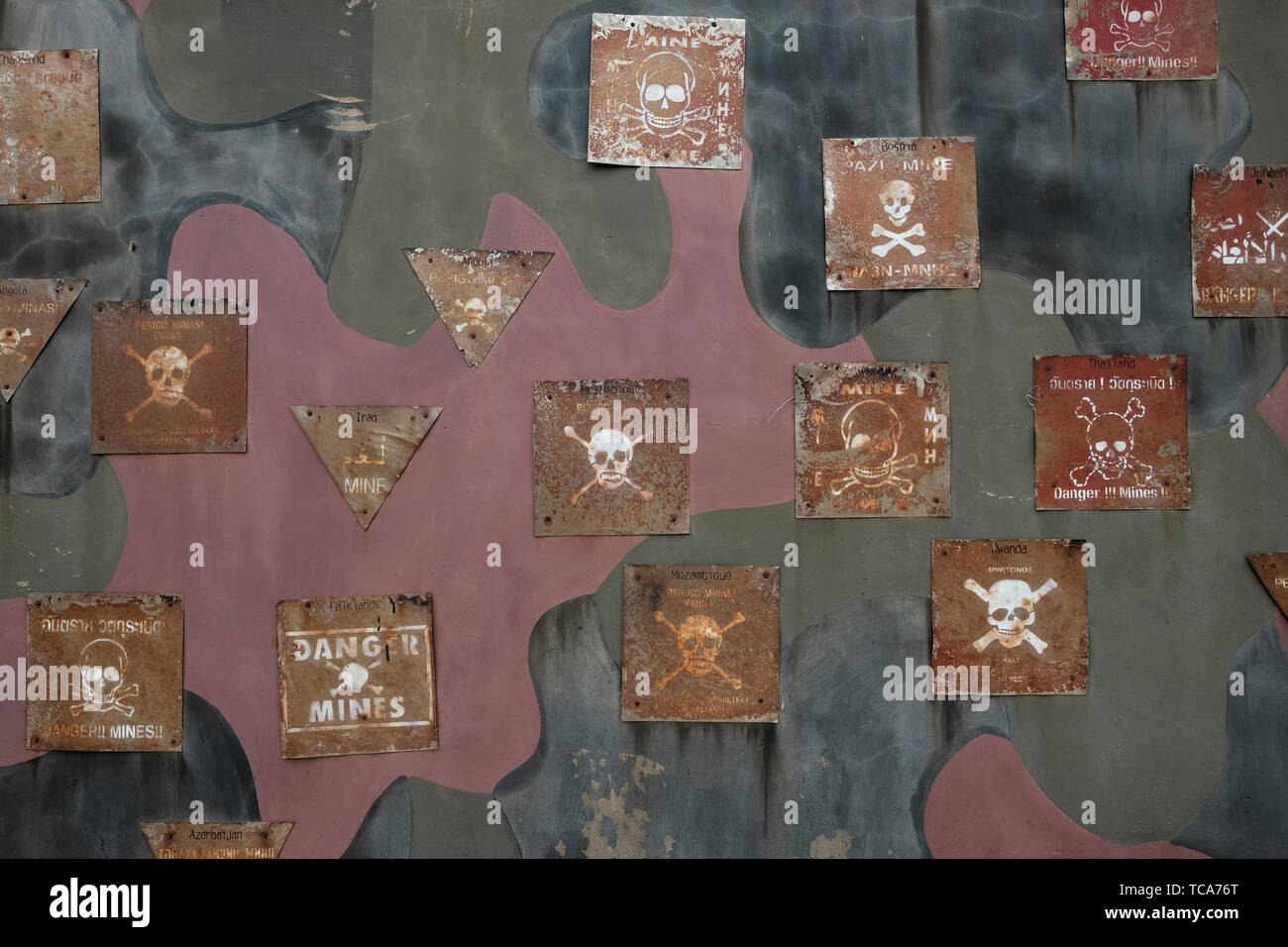 A collection of landmine warning signs from all over the world ...