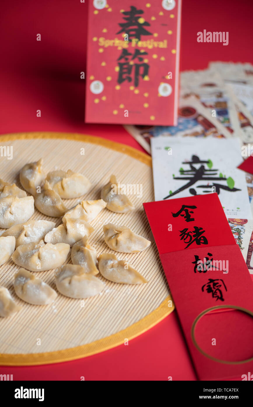 Spring Festival atmosphere and wrapped dumplings Stock Photo - Alamy