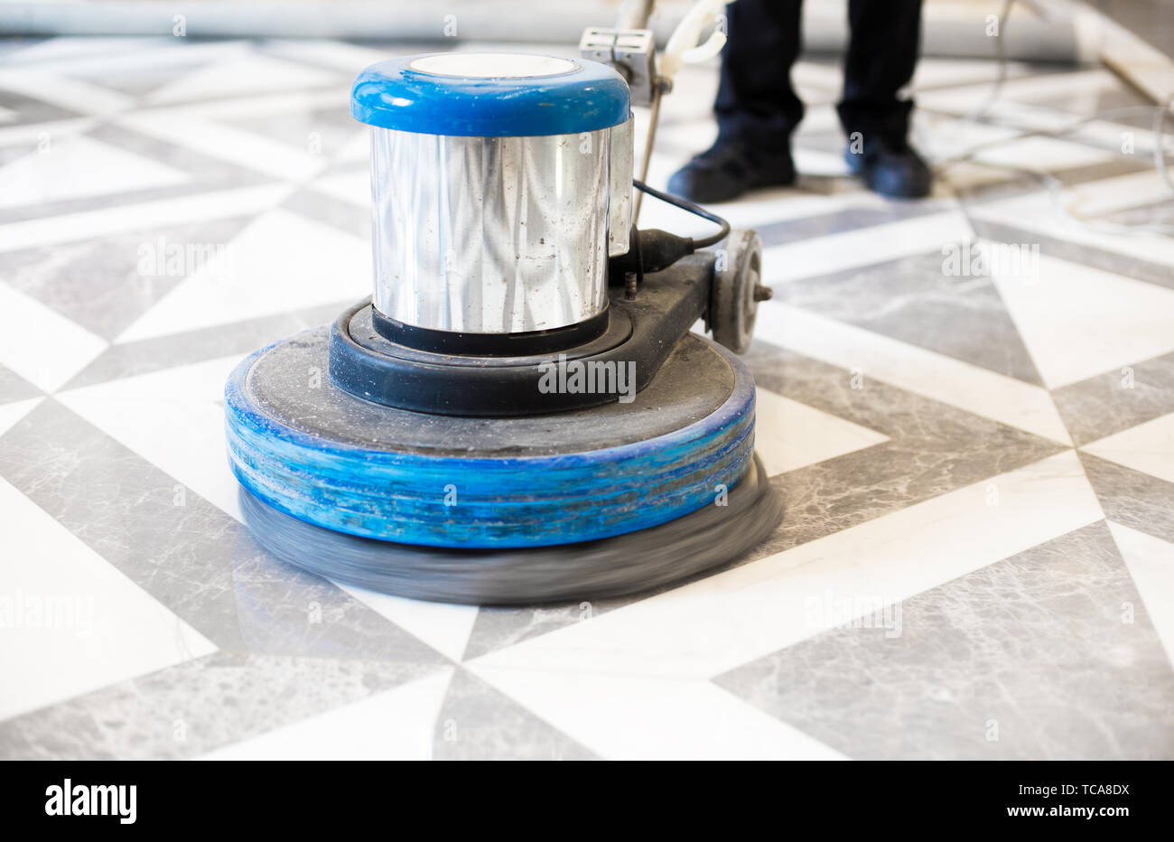 man polishing marble floor in modern office building Stock Photo - Alamy