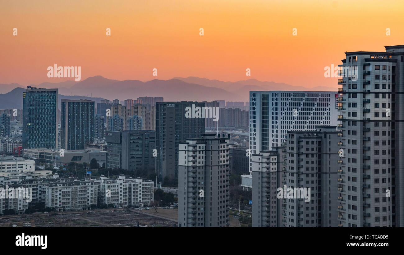City buildings in the sunset Stock Photo - Alamy