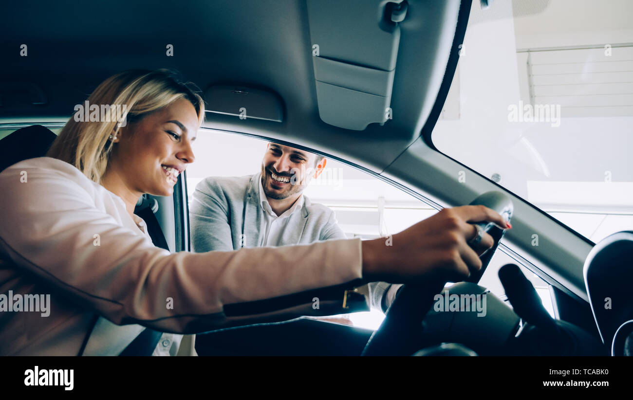 Portrait of happy customer buying new car Stock Photo - Alamy