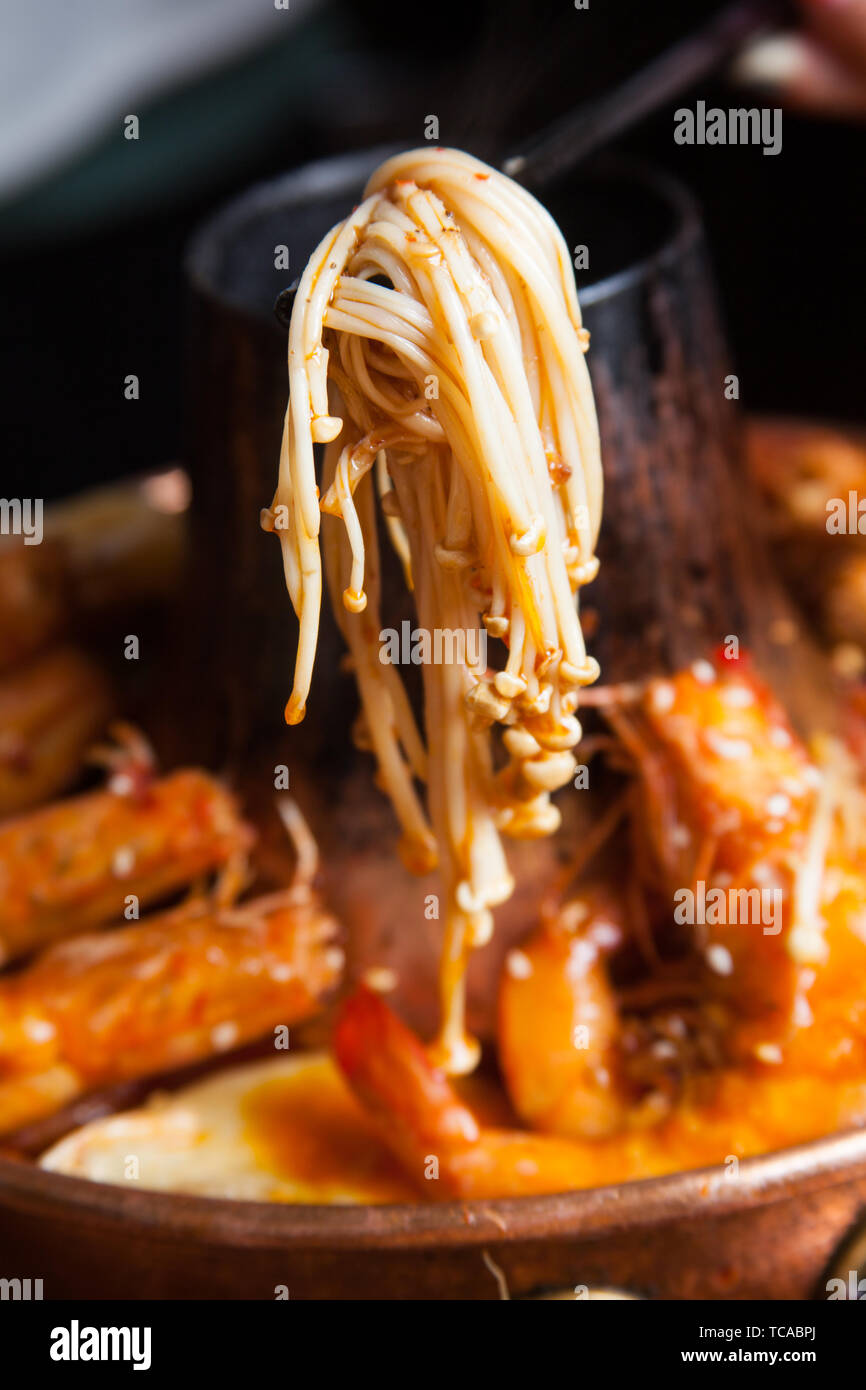 Charcoal grilled prawn pot combination Stock Photo - Alamy