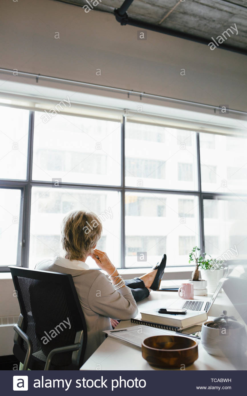 Feet out window hi-res stock photography and images - Alamy