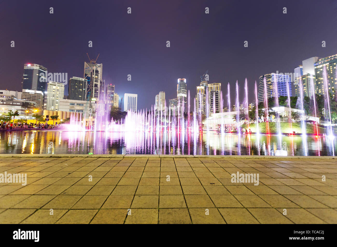 modern urban city traffic trails with cityscape background Stock Photo ...