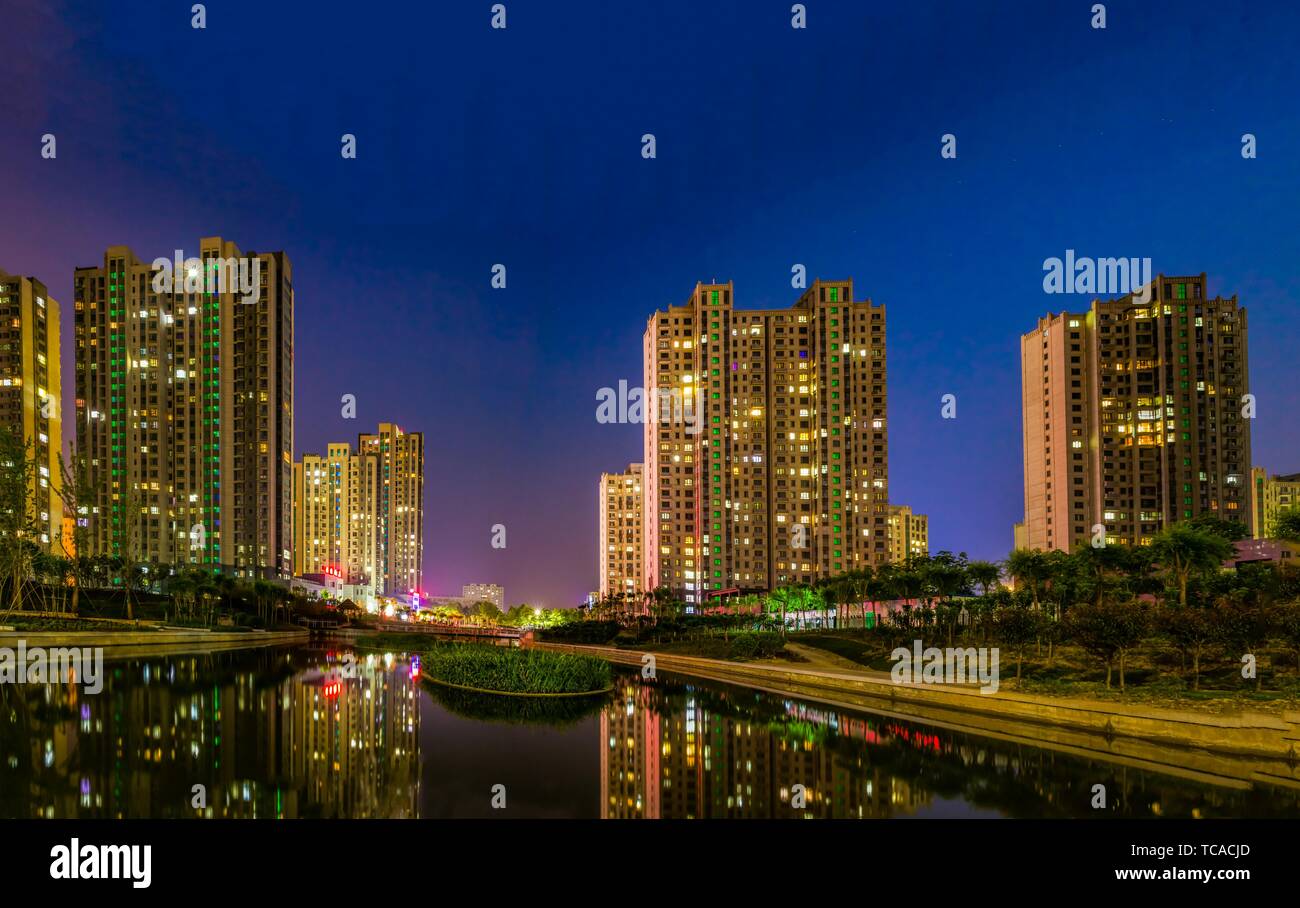 Night view of small town Stock Photo - Alamy