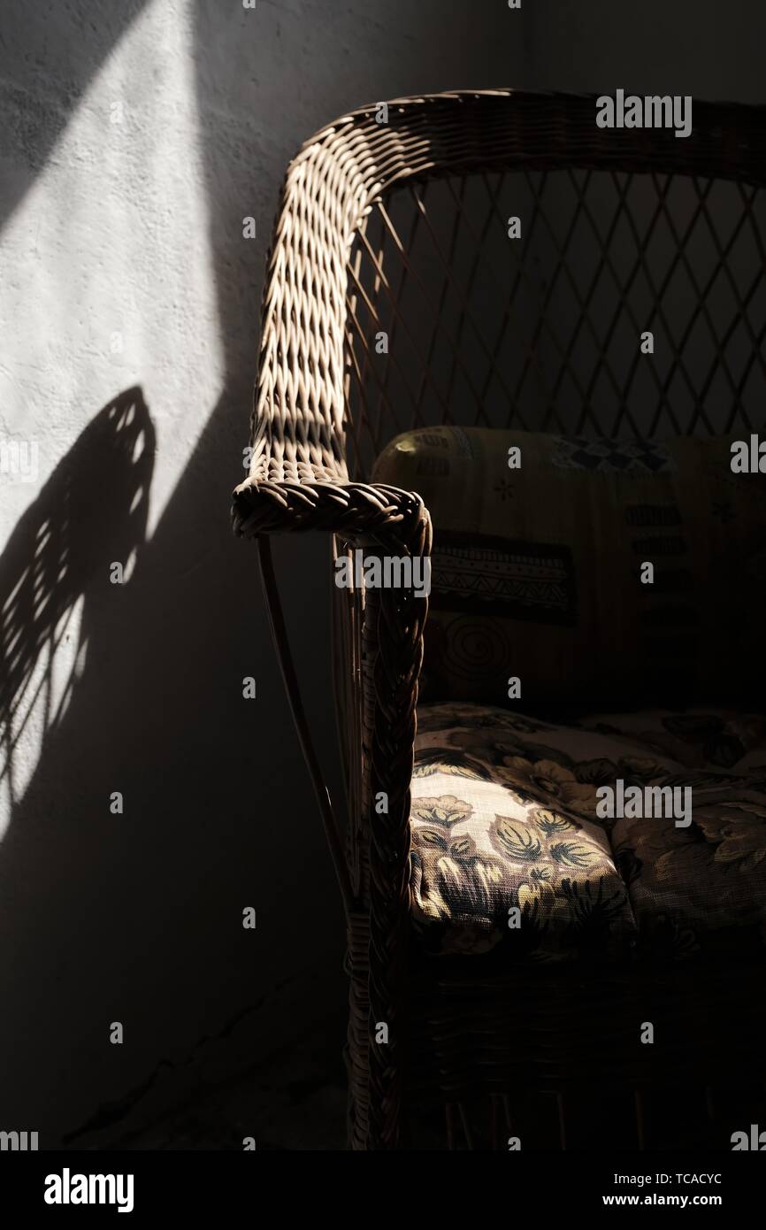 Wooden homemade chair in the corner of the room with a shadow Stock ...