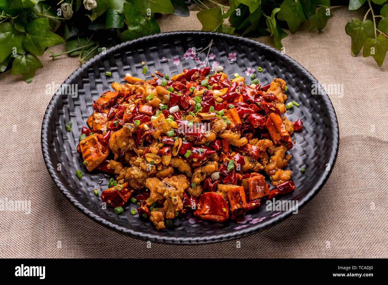 Chinese traditional cuisine chili chicken Stock Photo - Alamy