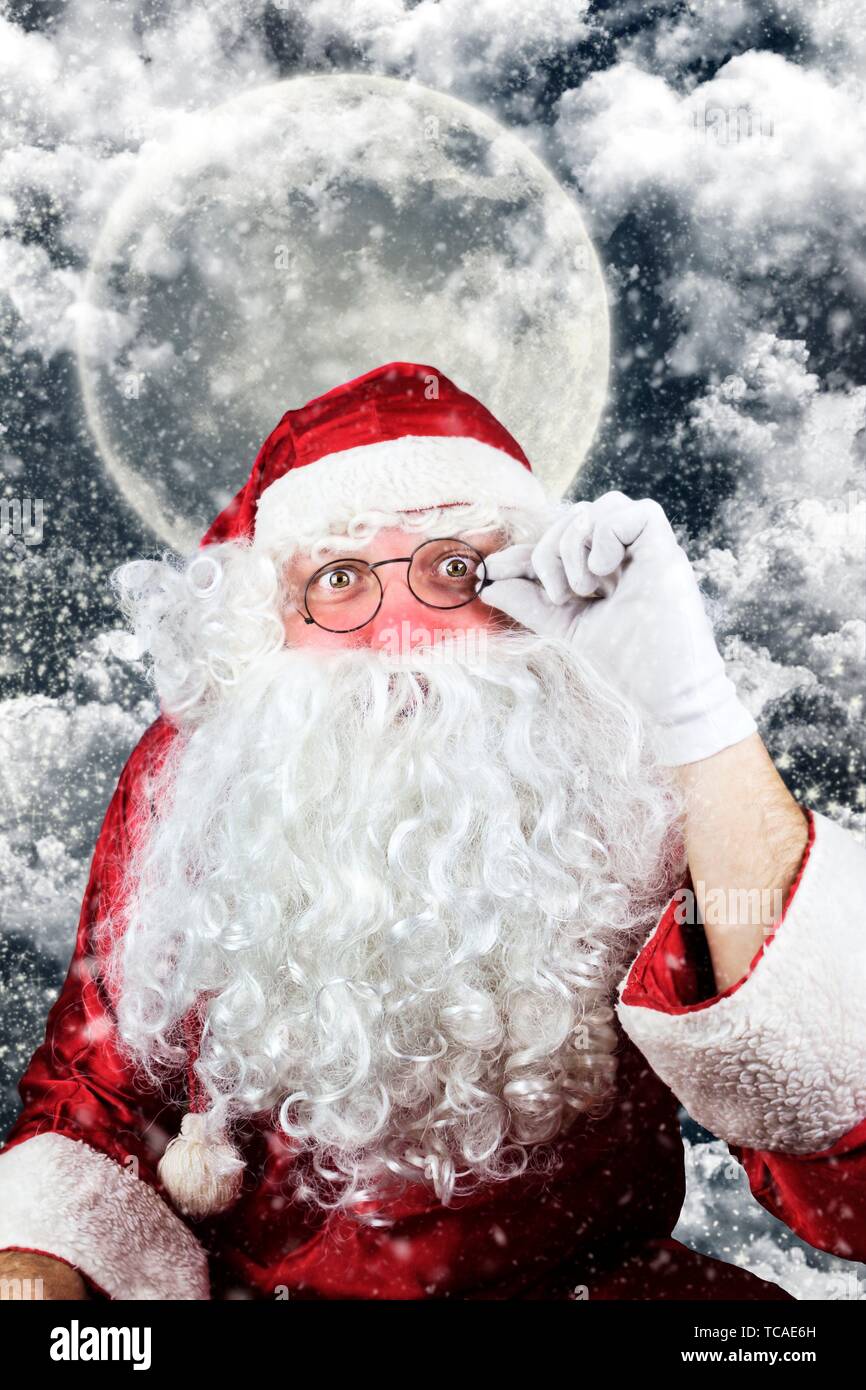 Santa Claus in the Christmas Night , with Sky full of Stars, Snow ...