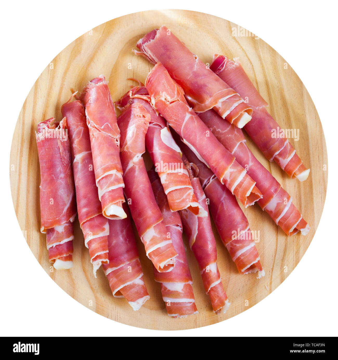 Close-up of sliced jamon– national dish of Spanish cuisine. Isolated ...
