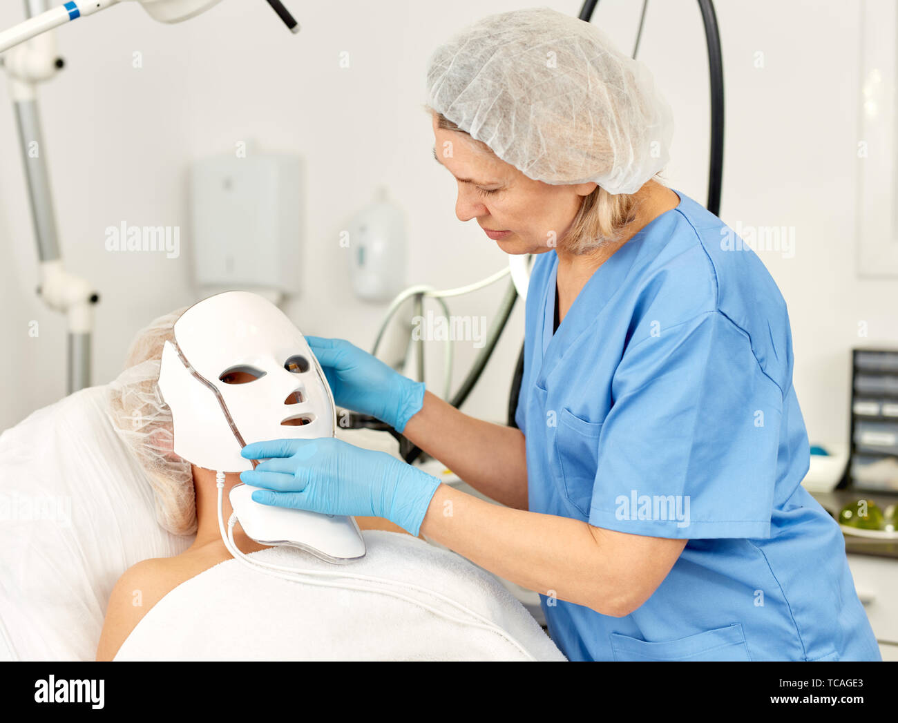 Pretty girl expects plastic surgery in aesthetic cosmetology clinic ...