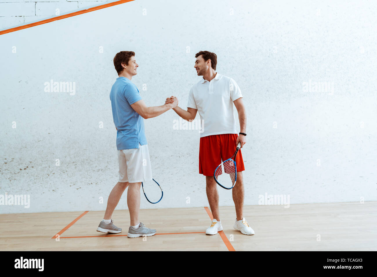 Handshake looking at each other hi-res stock photography and images - Alamy