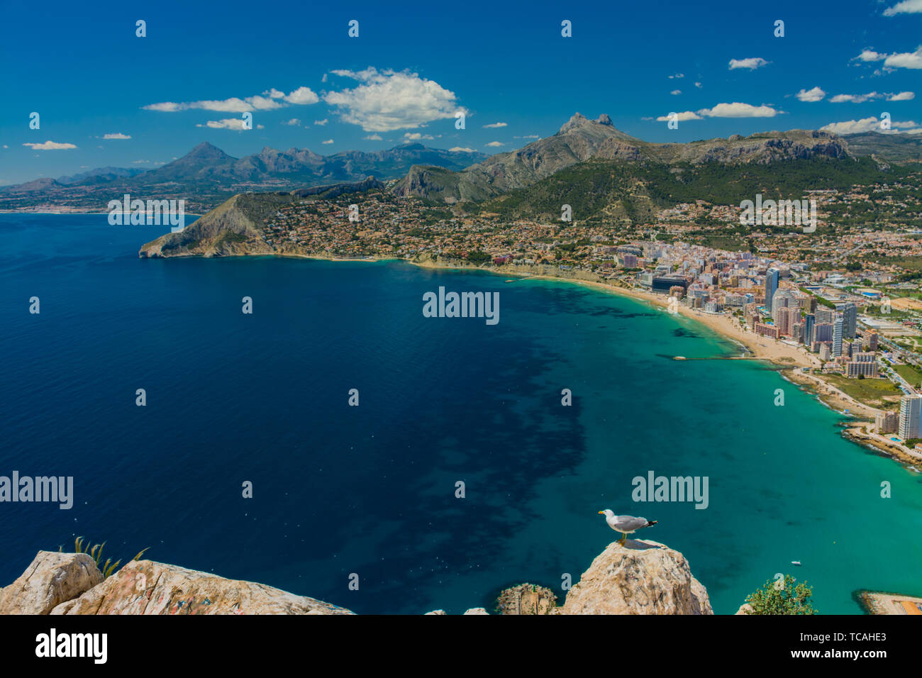 View of the residential area and some hotels in Calpe with the Aitana mountain range at ...
