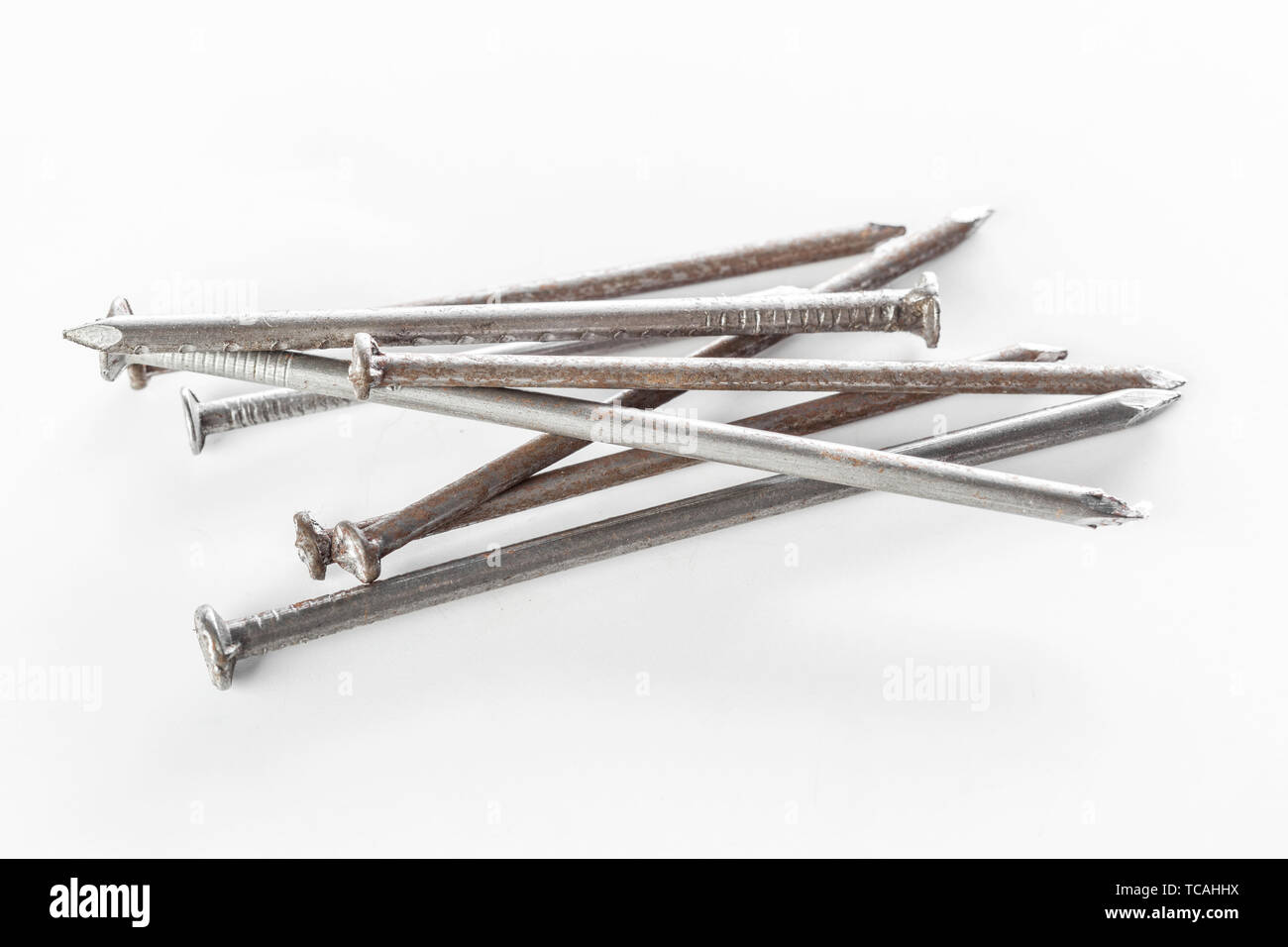 nail isolated on white Stock Photo - Alamy