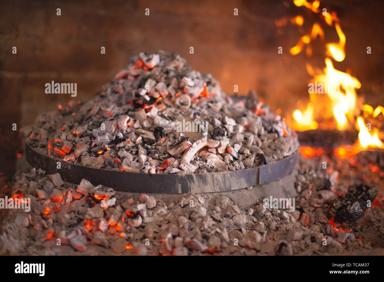 Traditional croatian dish peka in iron bell under glow, food of Croatia ...
