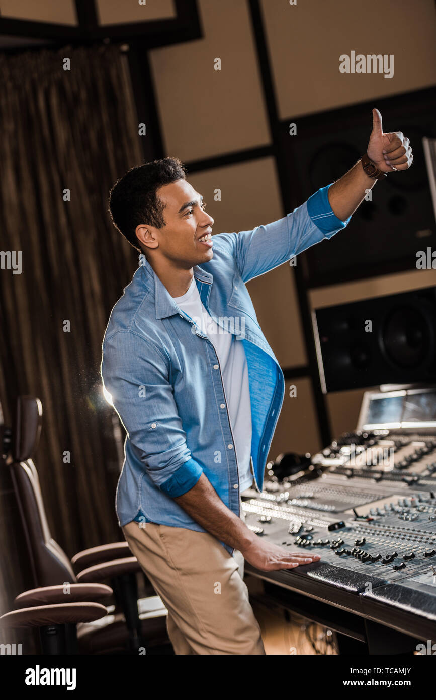 Sound producer showing thumb hi-res stock photography and images - Alamy