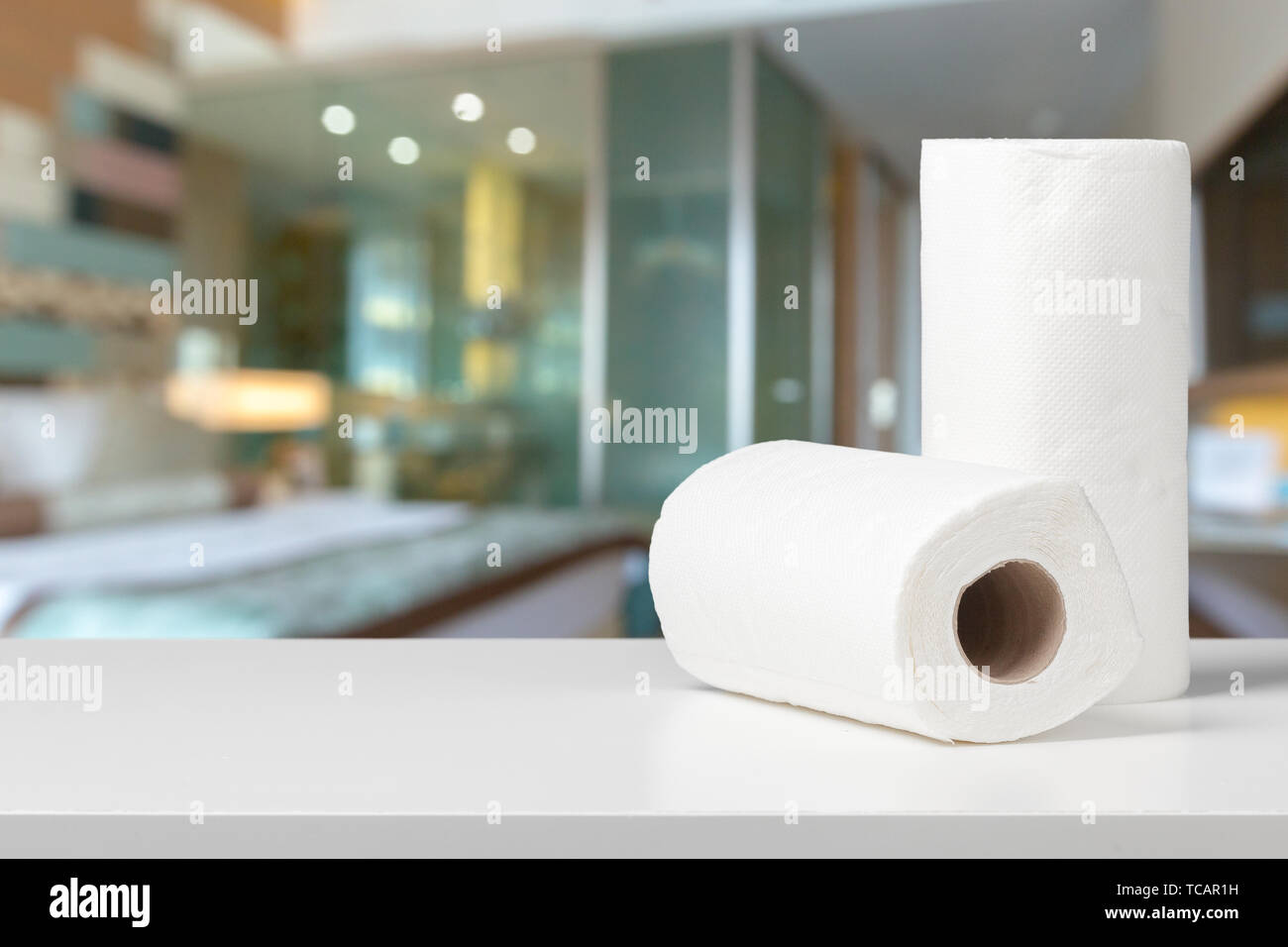 Soft paper towels on a white desk front view Stock Photo - Alamy