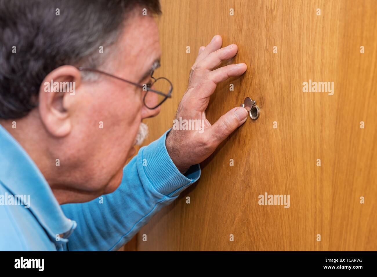 Eye looking through lock hi-res stock photography and images - Alamy