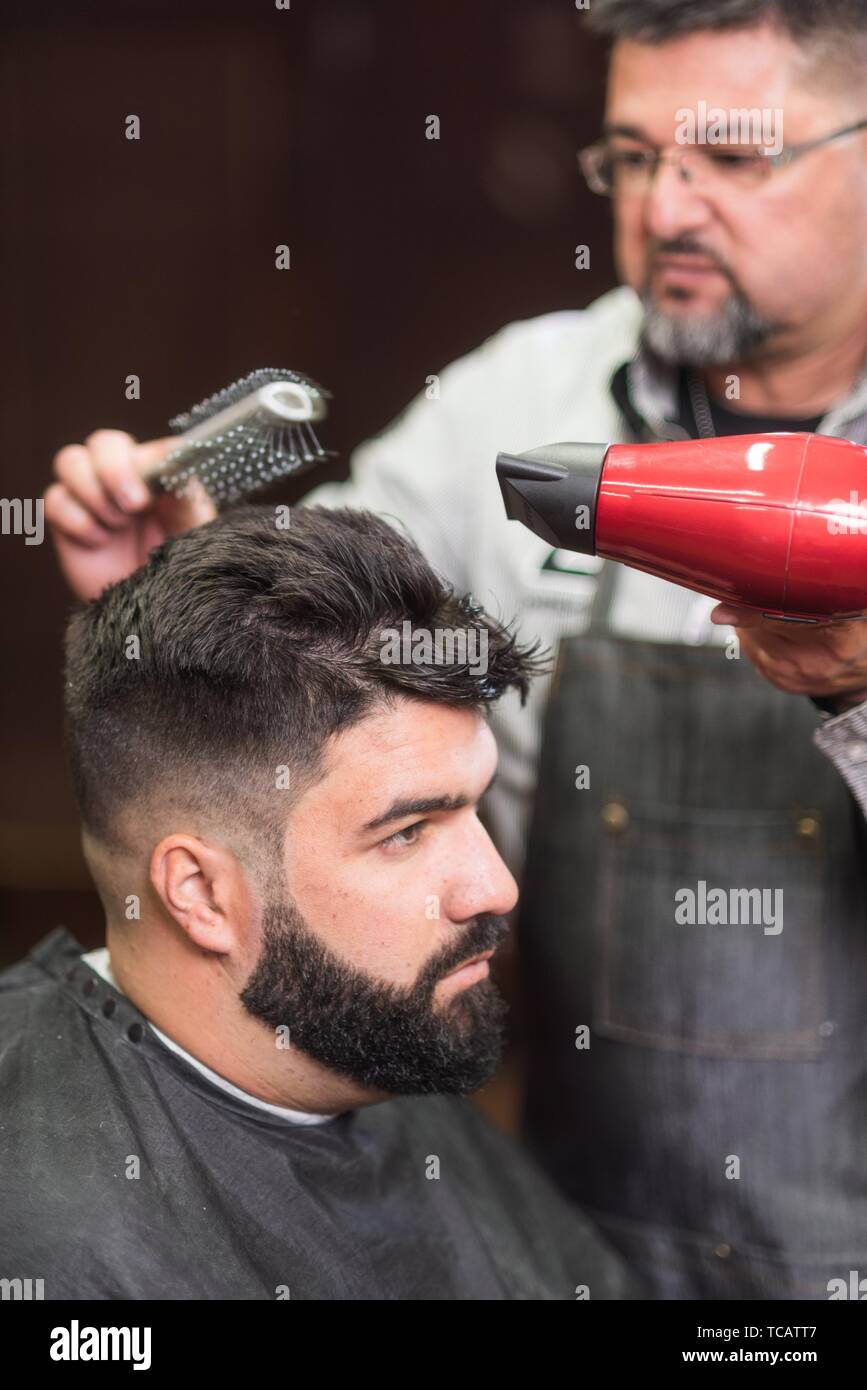 Barber doing hi-res stock photography and images - Alamy