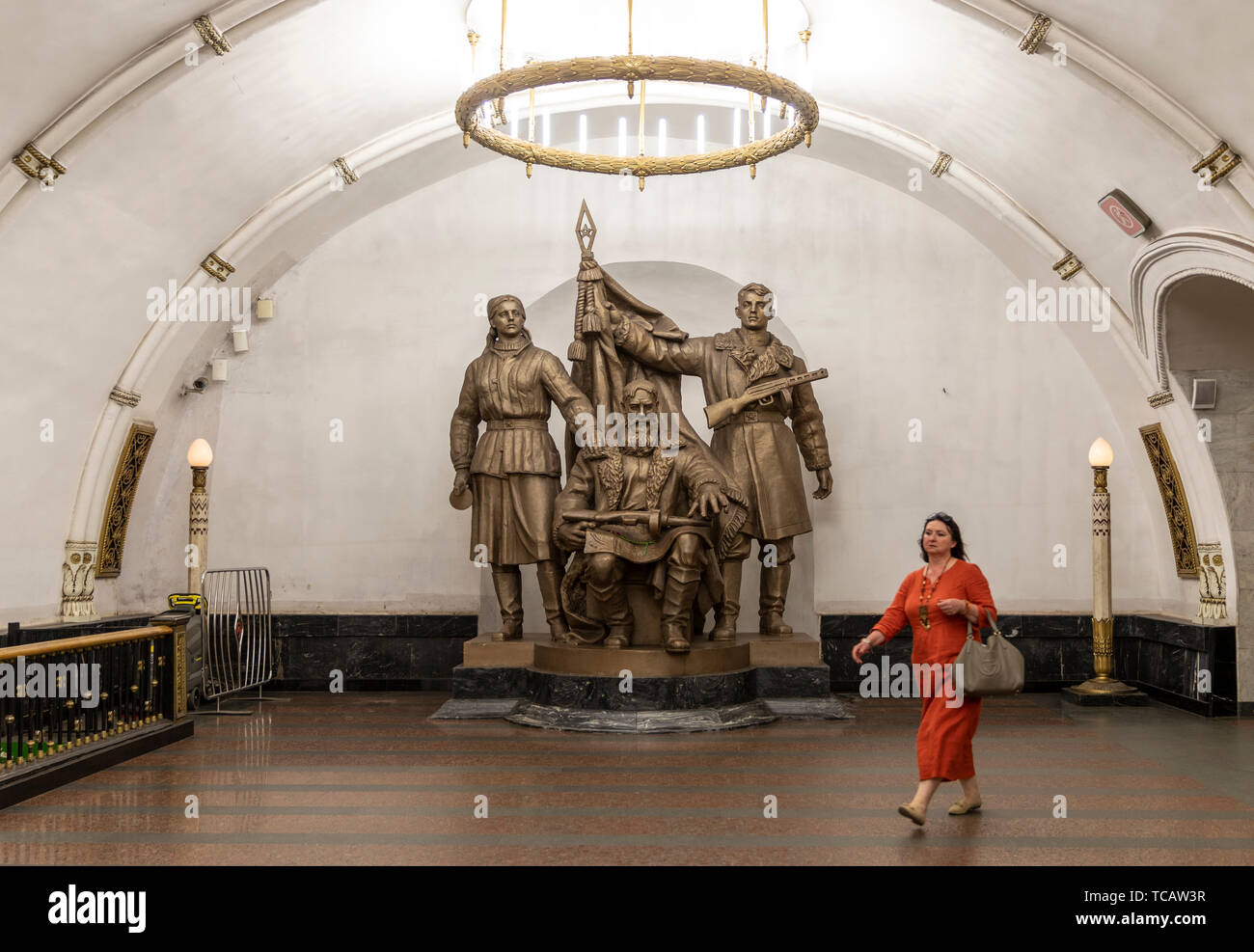 Woman walking on subway concourse, Belorusskaya Station, Moscow Subway ...