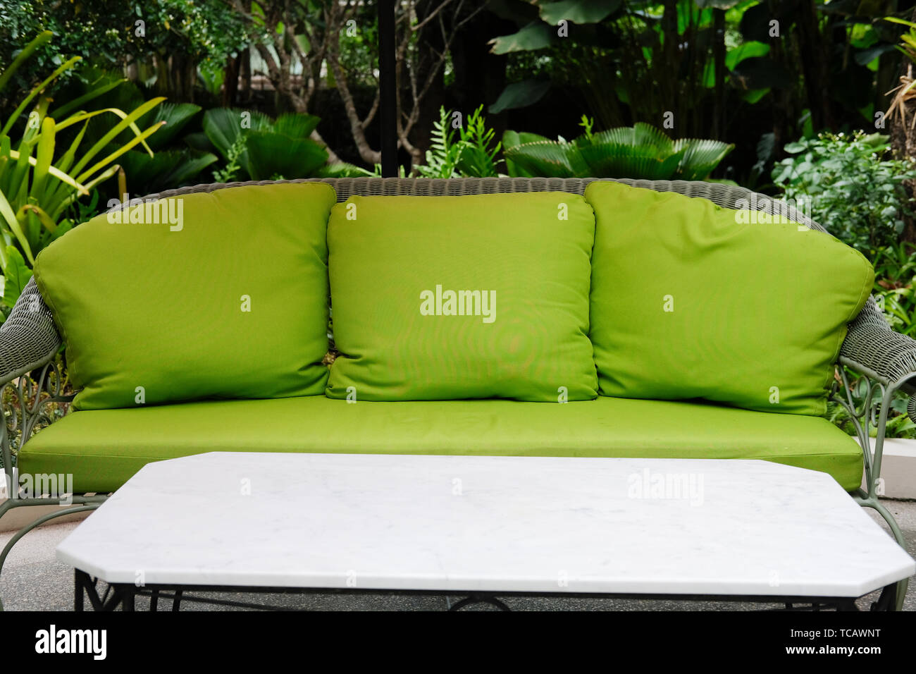 green rattan chair in terrace balcony. living design for home interior ...