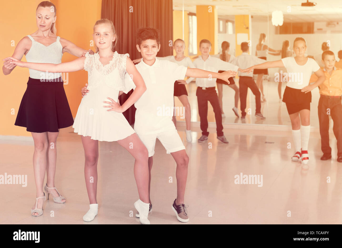 smiling swedish children dancing pair dance in class Stock Photo - Alamy