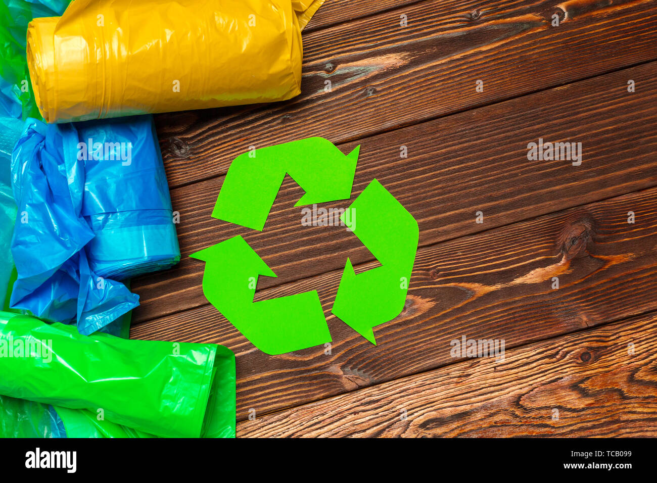 Eco concept with recycling symbol on table background top view Stock ...