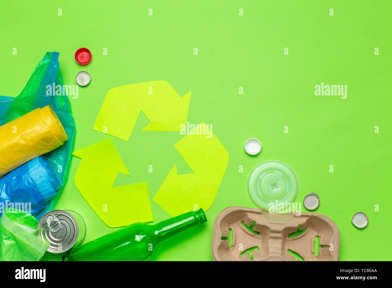 Eco concept with recycling symbol on table background top view Stock ...