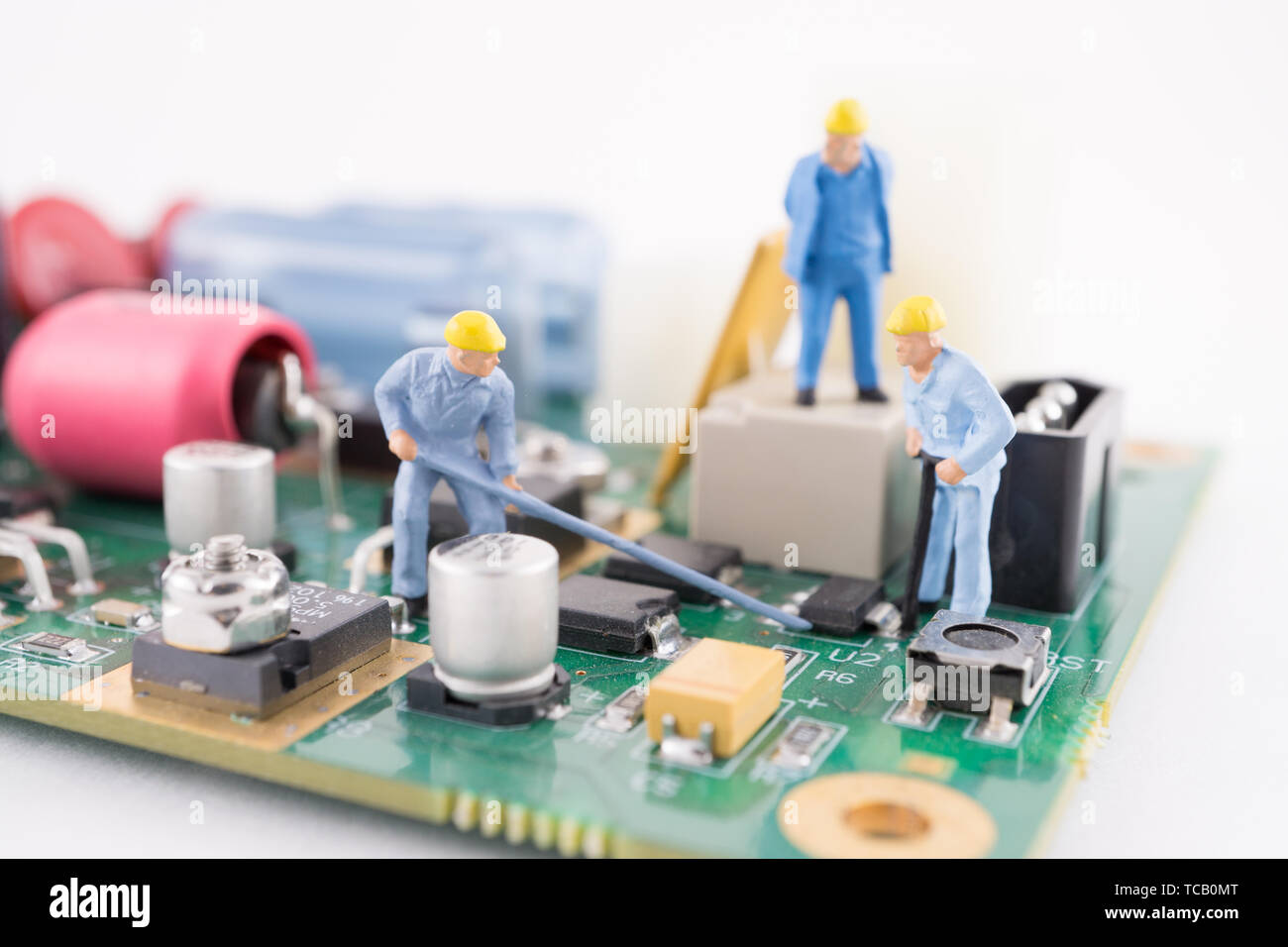 Construction crew fixing circuit Stock Photo - Alamy