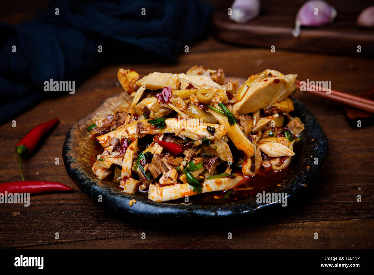 drooling chicken, stick chicken Stock Photo - Alamy