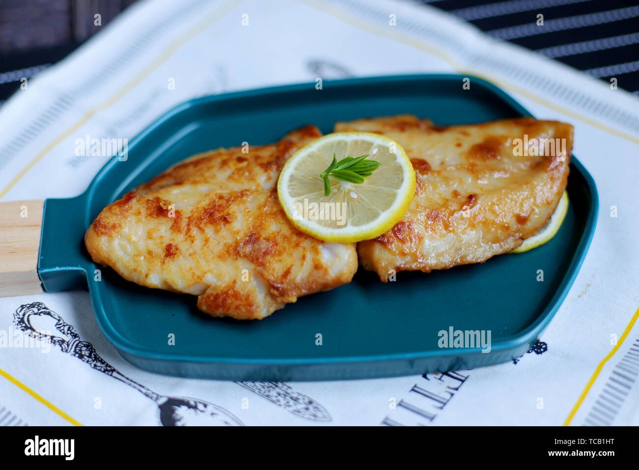 Fried dragon fish, fish and fillet Stock Photo - Alamy